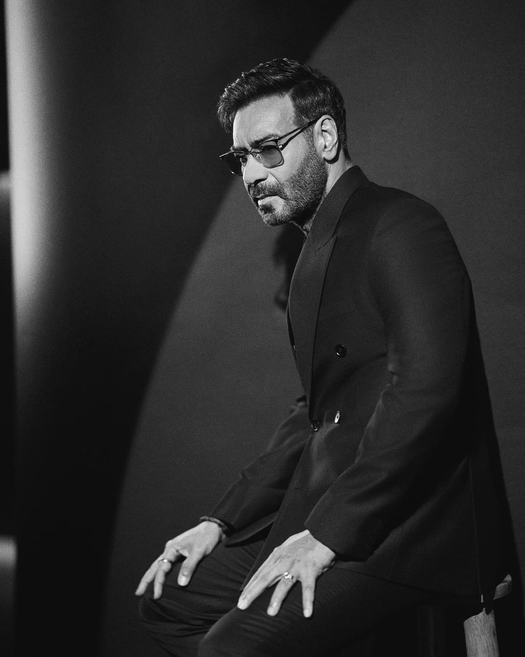 Ajay Devgn graces his look in a black suit